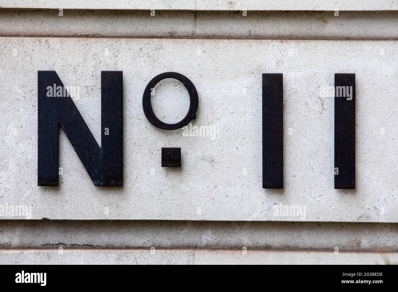 The Number 11 displayed on a wall Stock Photo - Alamy