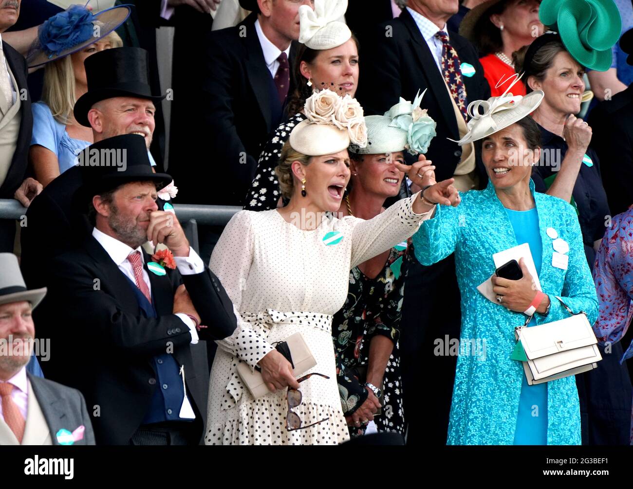 Zara Tindall and Anna Lisa Balding (right) react as they watch the King ...