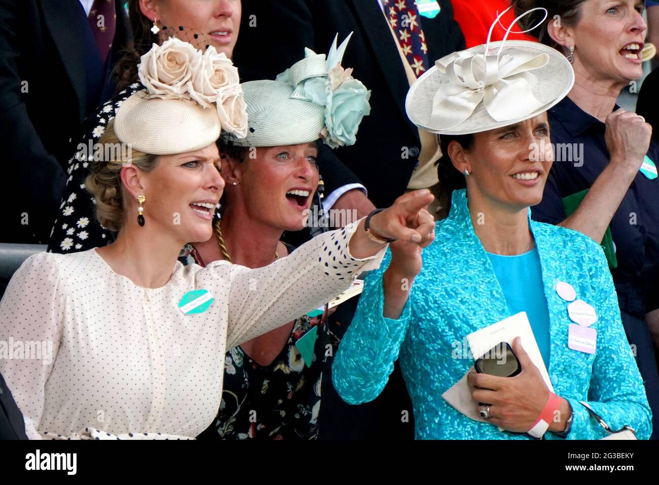 Zara Tindall (left), Dolly Maude and Anna Lisa Balding (right) react as ...
