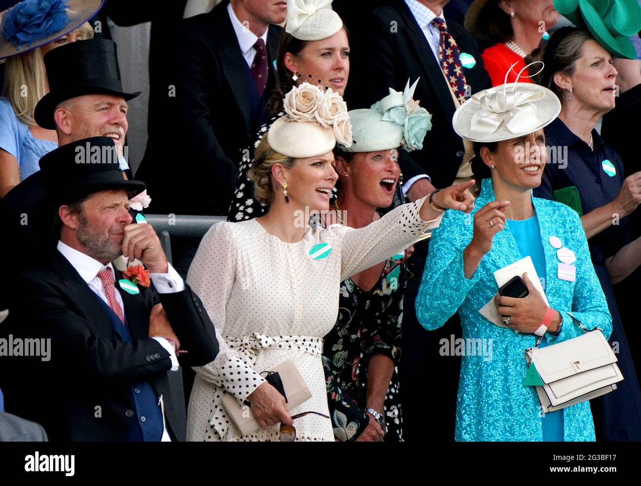Zara Tindall (left), Dolly Maude and Anna Lisa Balding (right) react as ...