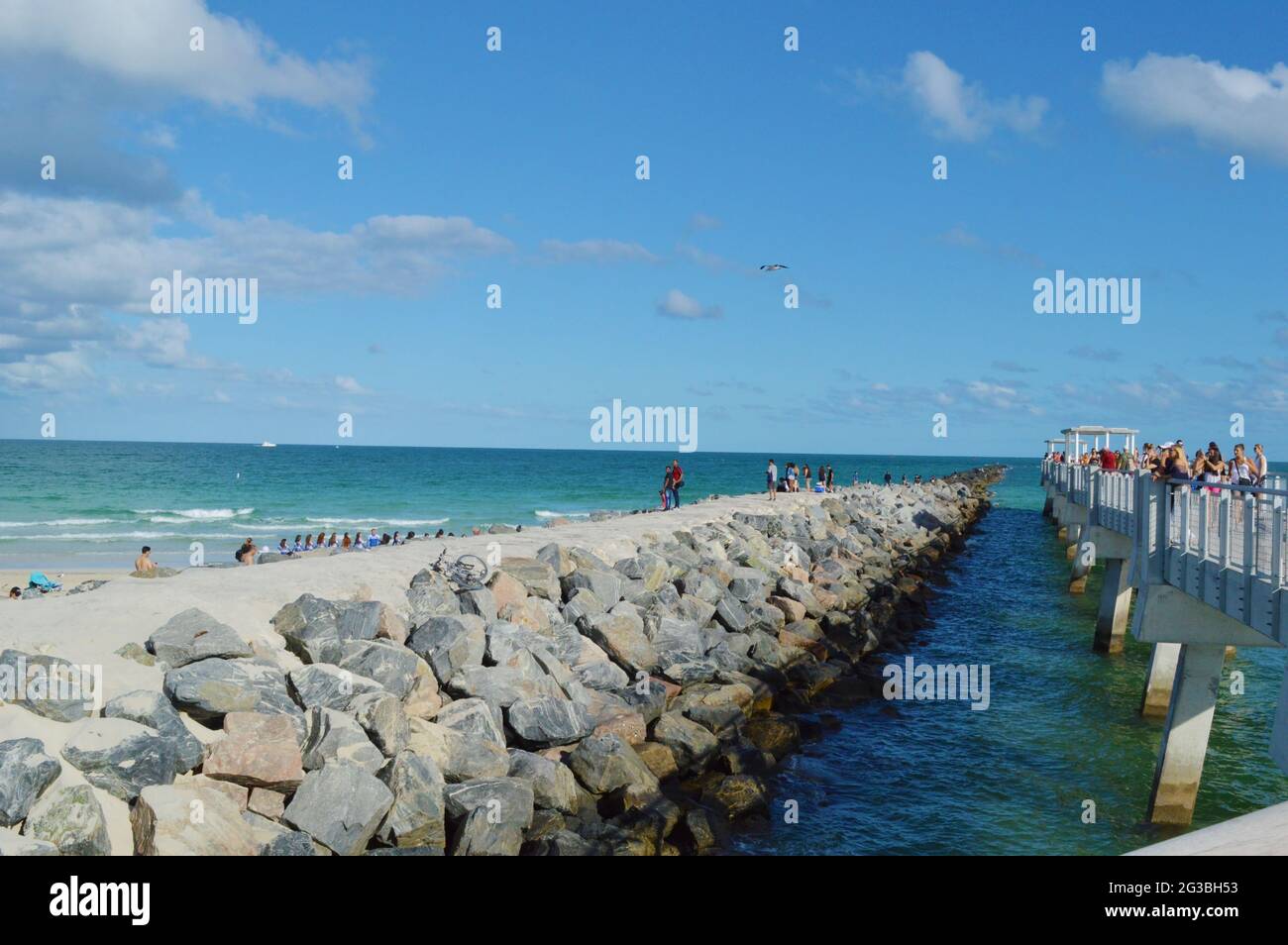 Tourists gather at Miami South Beach pier, Florida, USA Stock Photo - Alamy