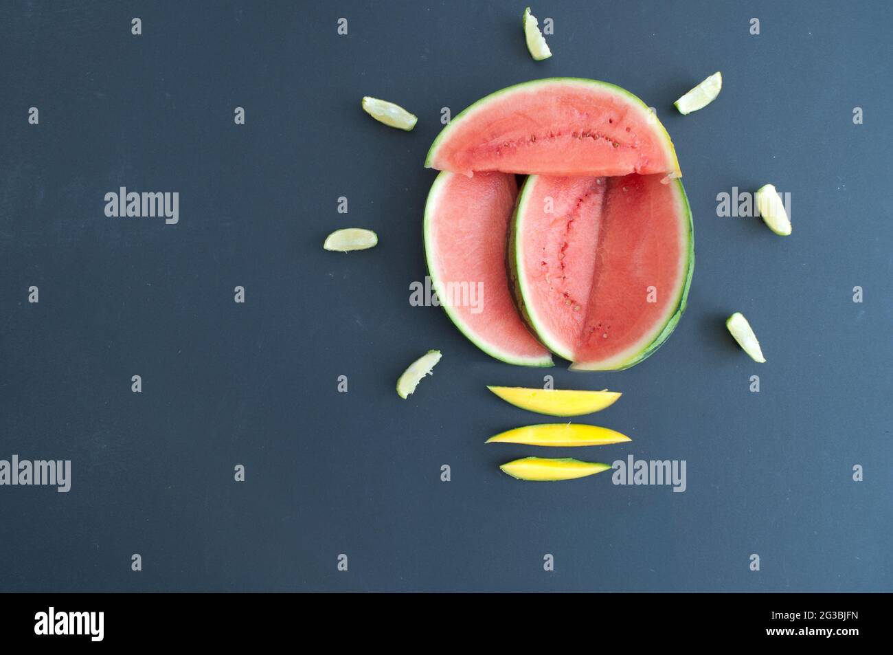 Healthy food ideas concept, light bulb made with watermelon, mango and ...