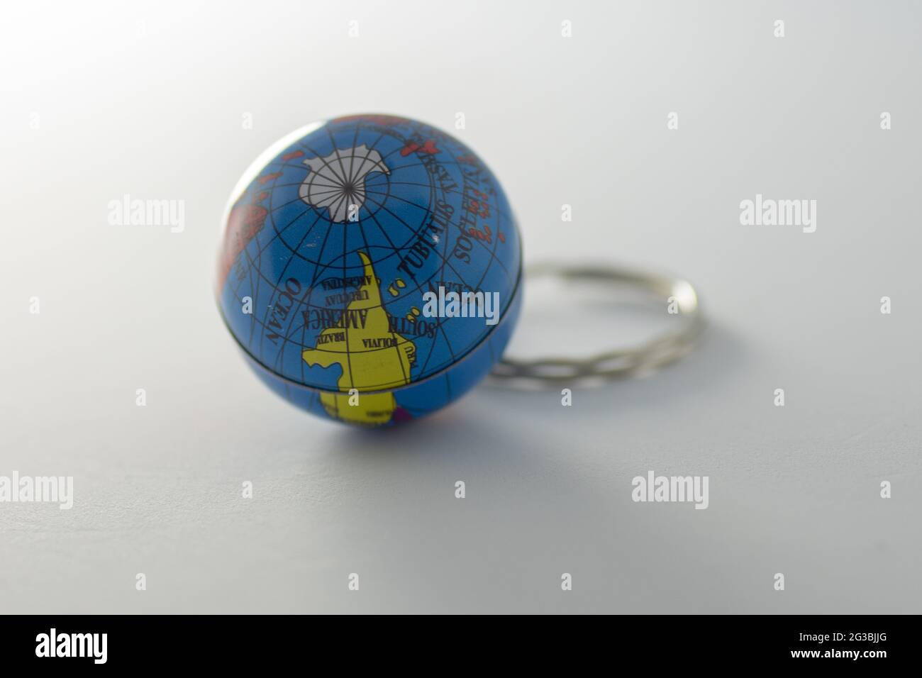 Closeup shot of a globe key chain Stock Photo - Alamy