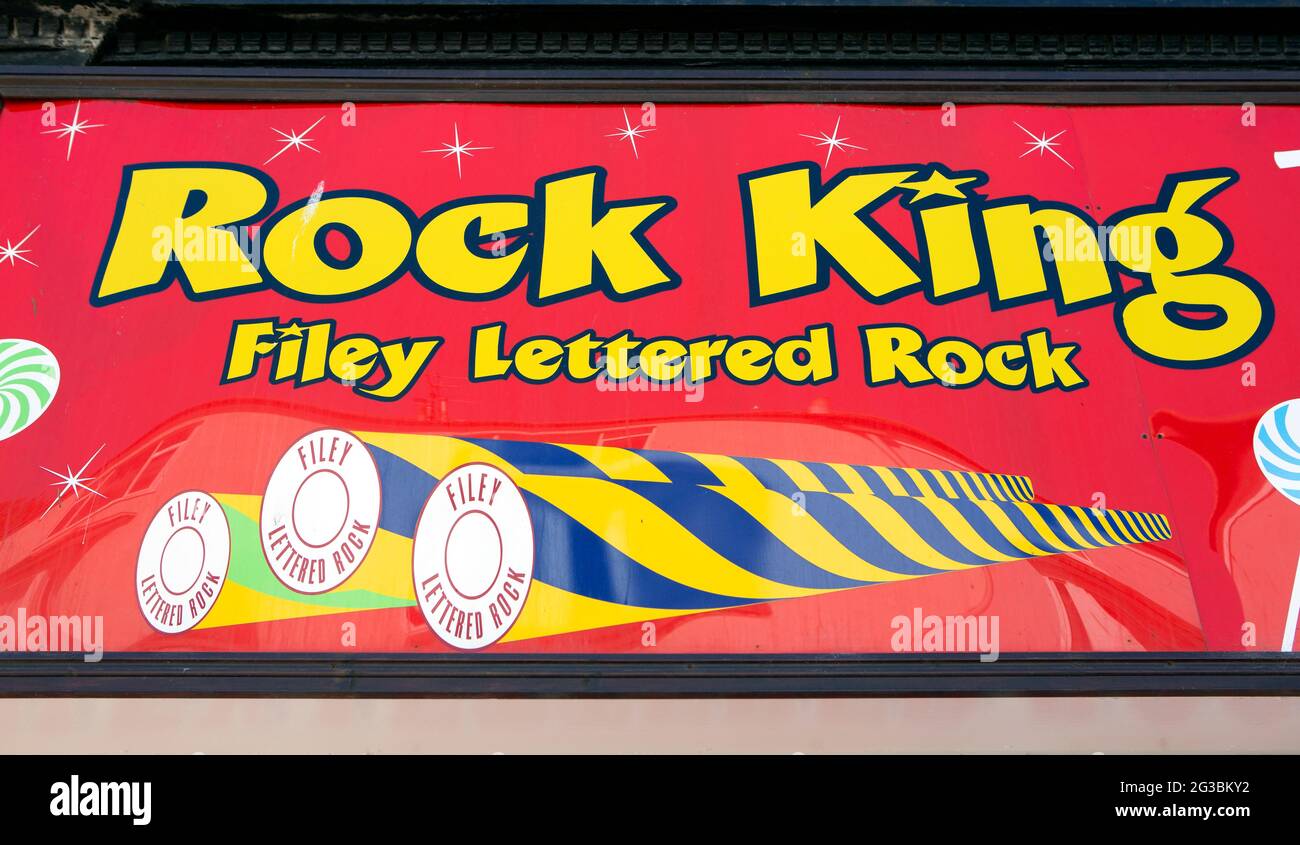 Rock King shop sign which sells ‘Lettered Rock’ in Filey in north ...