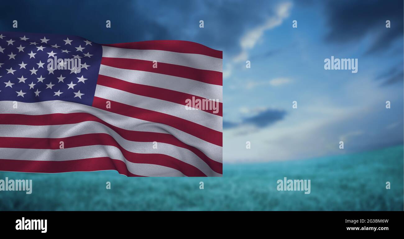 Composition of american flag billowing over blue ocean cloudy blue sky ...