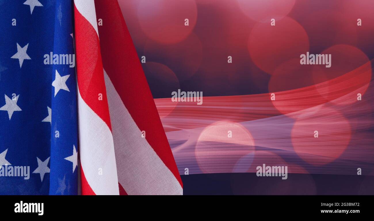 Composition of billowing american flag over defocussed red bokeh lights ...