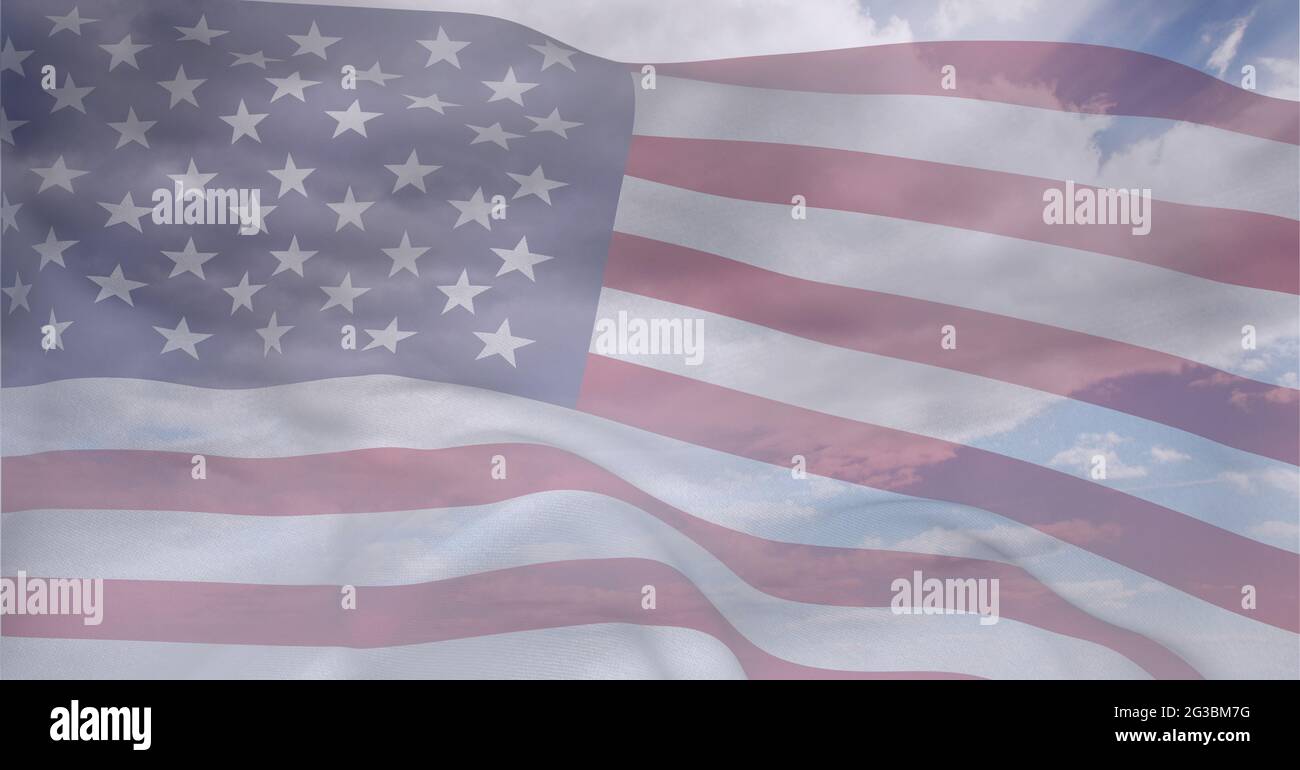 Composition of billowing american flag over cloudy blue sky Stock Photo ...