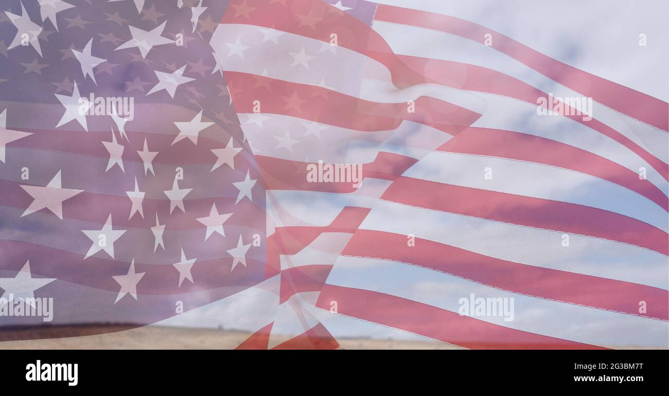 Composition of billowing american flag over cloudy blue sky Stock Photo ...
