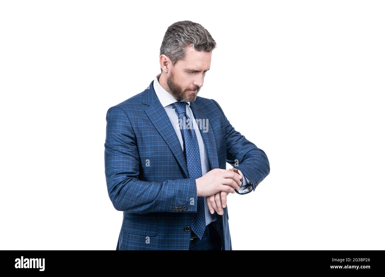 Professional man in formal suit check time by wrist watch isolated on ...