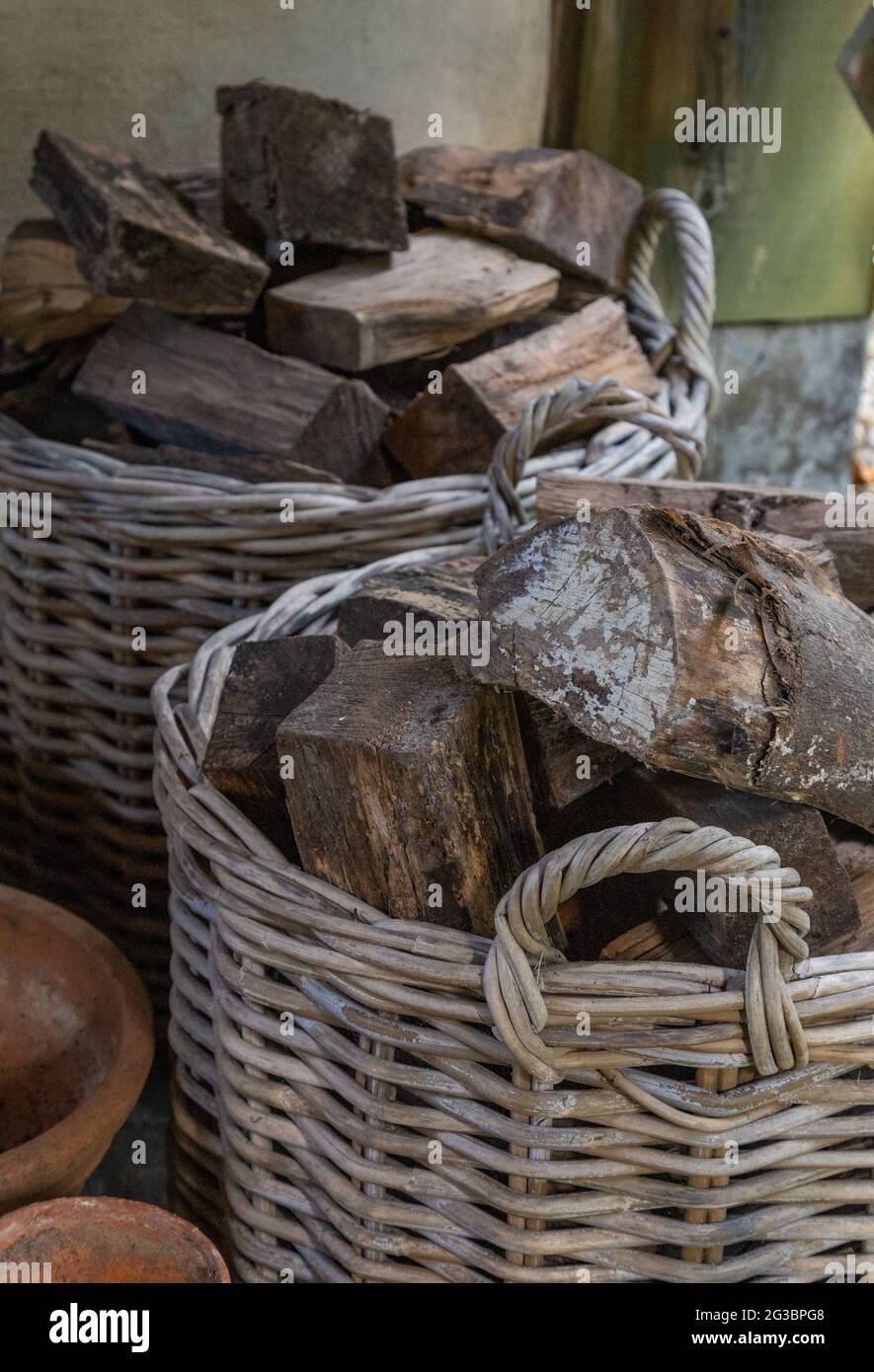 Chopped wood in baskets hi-res stock photography and images - Alamy