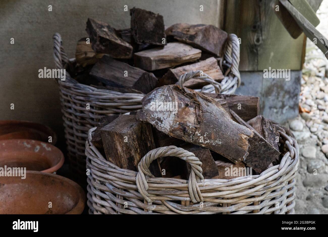 Baskets of chopped wood Stock Photo - Alamy