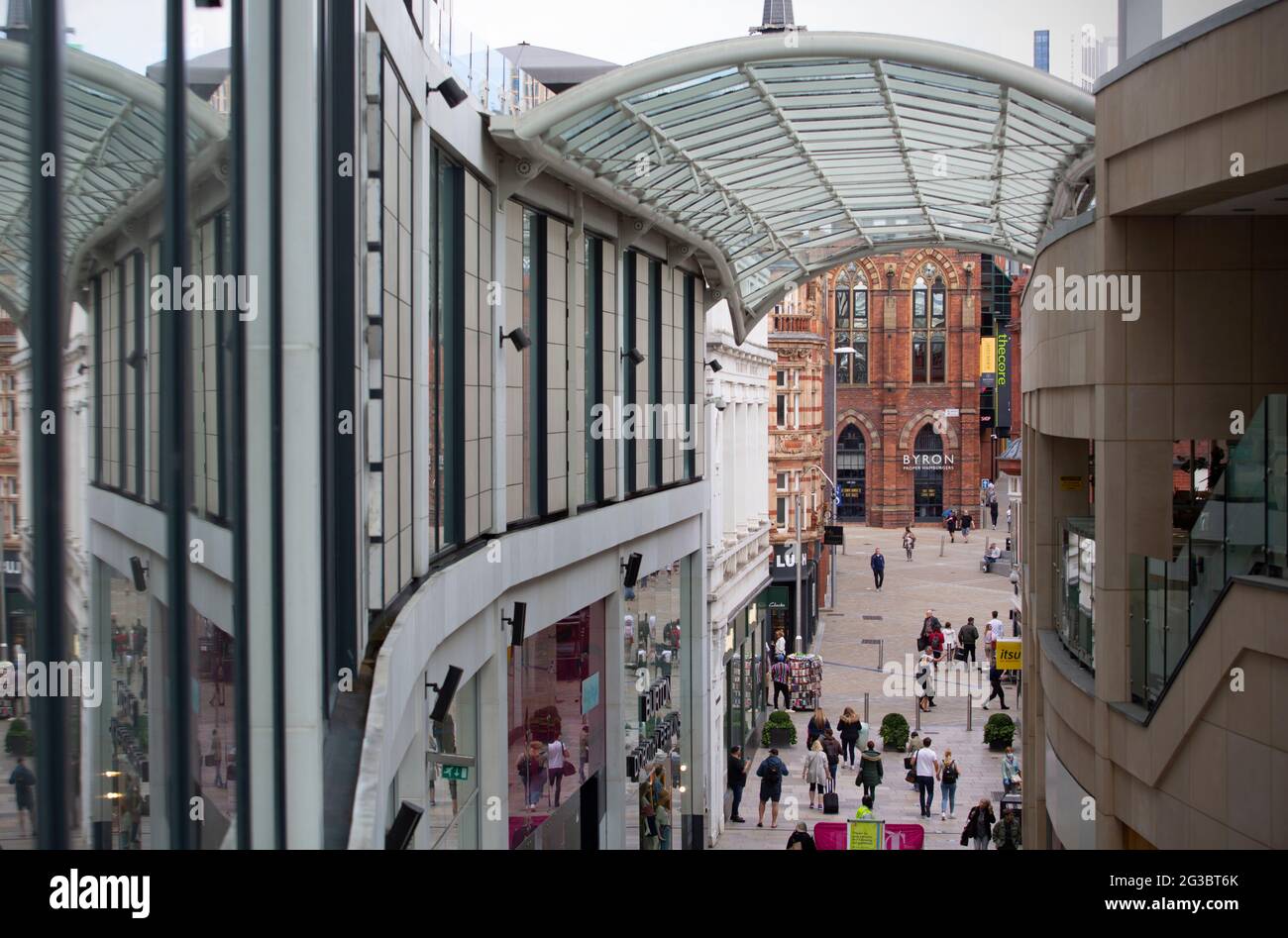 People walking through the shopping area of Leeds city centre. Leeds is ...