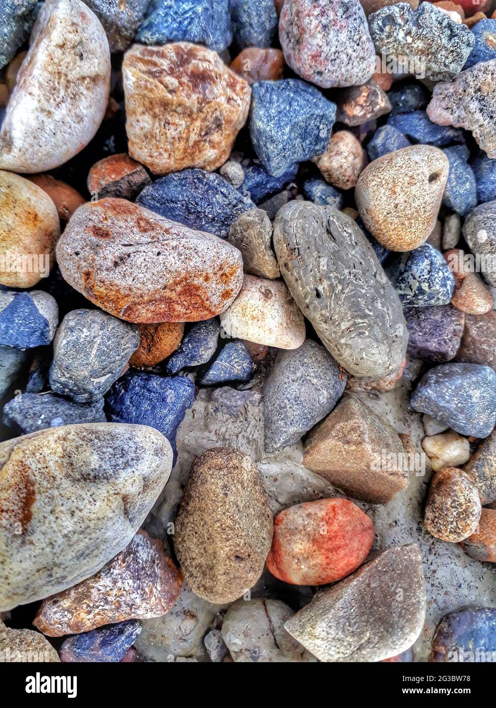 Vertical shot of big and small stones on the beach - perfect for ...