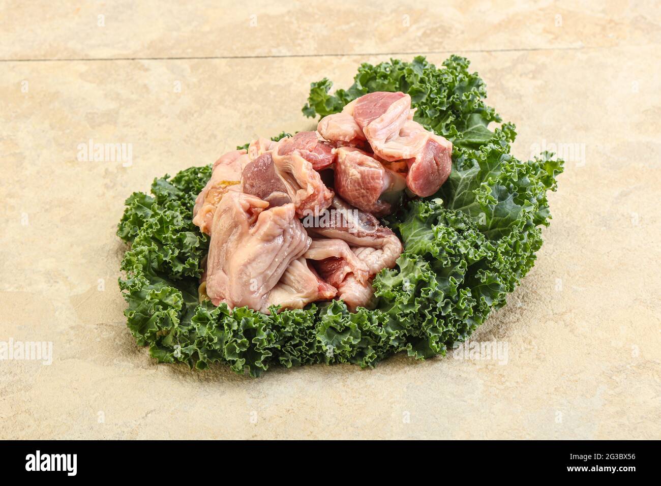 Raw tasty chicken stomach for cooking Stock Photo - Alamy