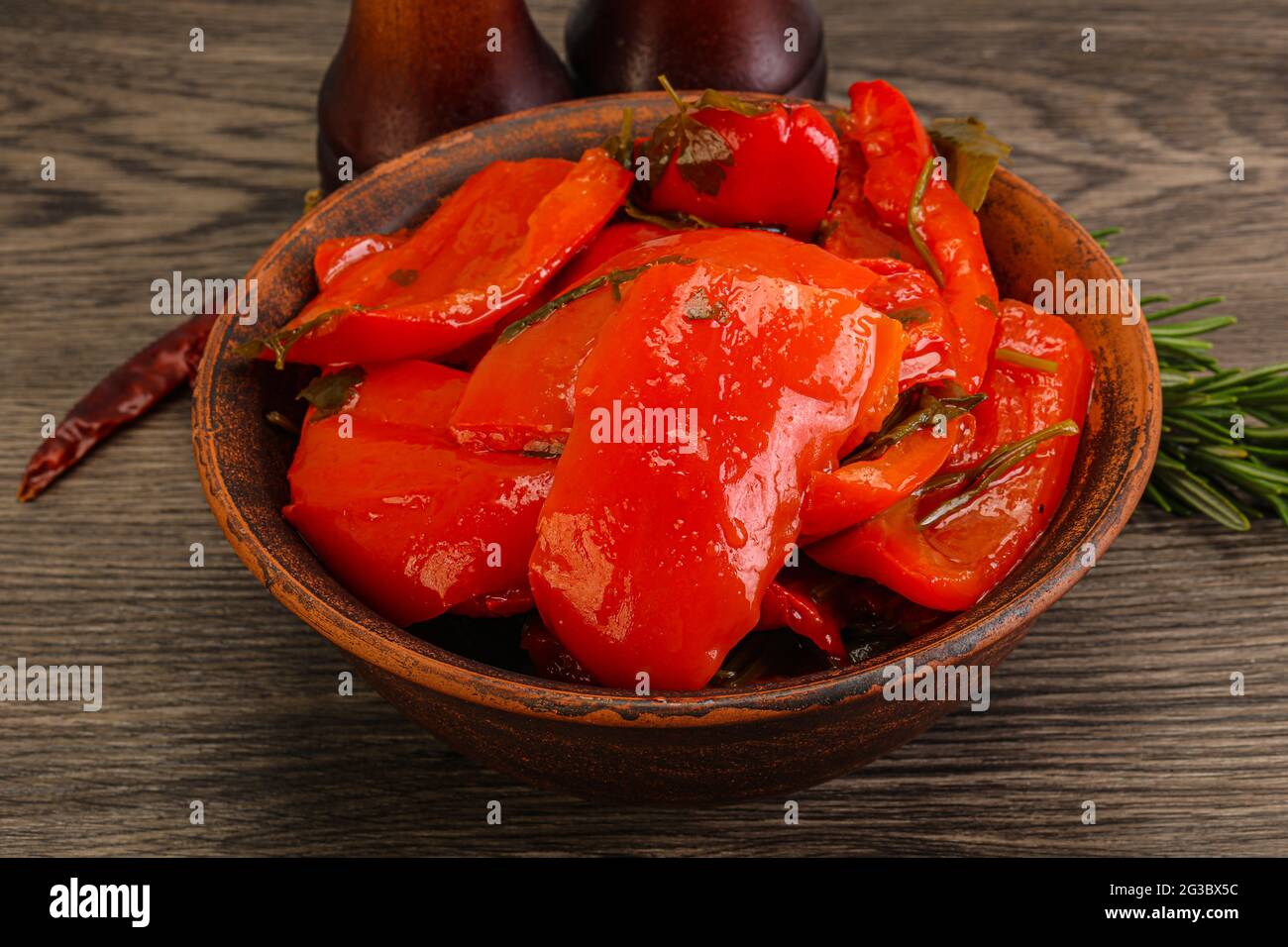 Marinated red bell pepper with spices Stock Photo - Alamy