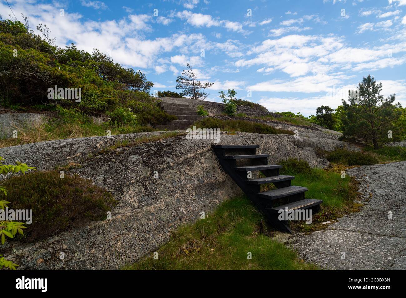 the beautiful coast of norway with its rock formations and blue water ...