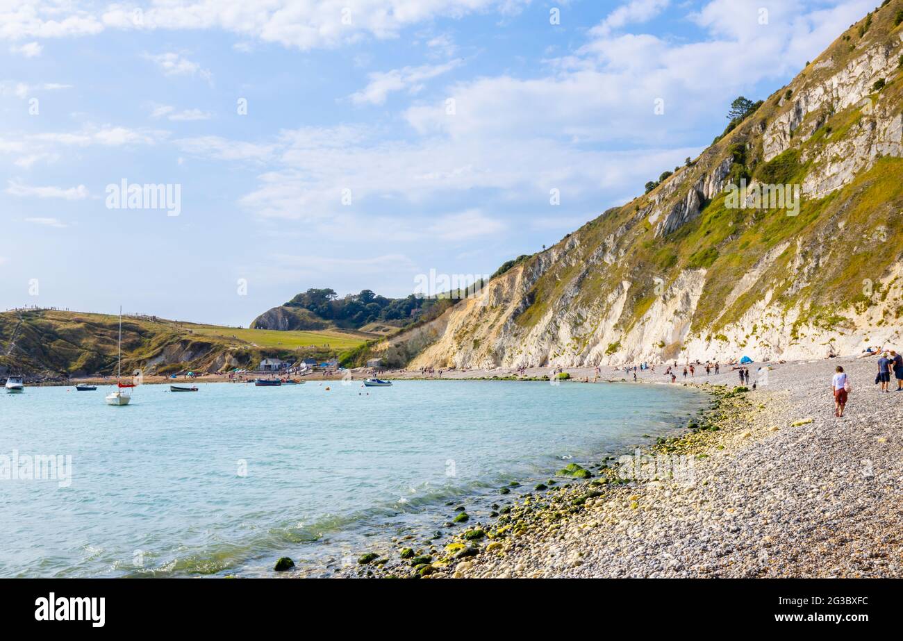 Picturesque coastal view of the bay and chalk cliffs at Lulworth Cove ...