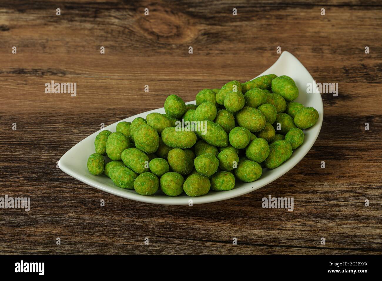 Spicy wasabi peanuts snack in the bowl Stock Photo - Alamy