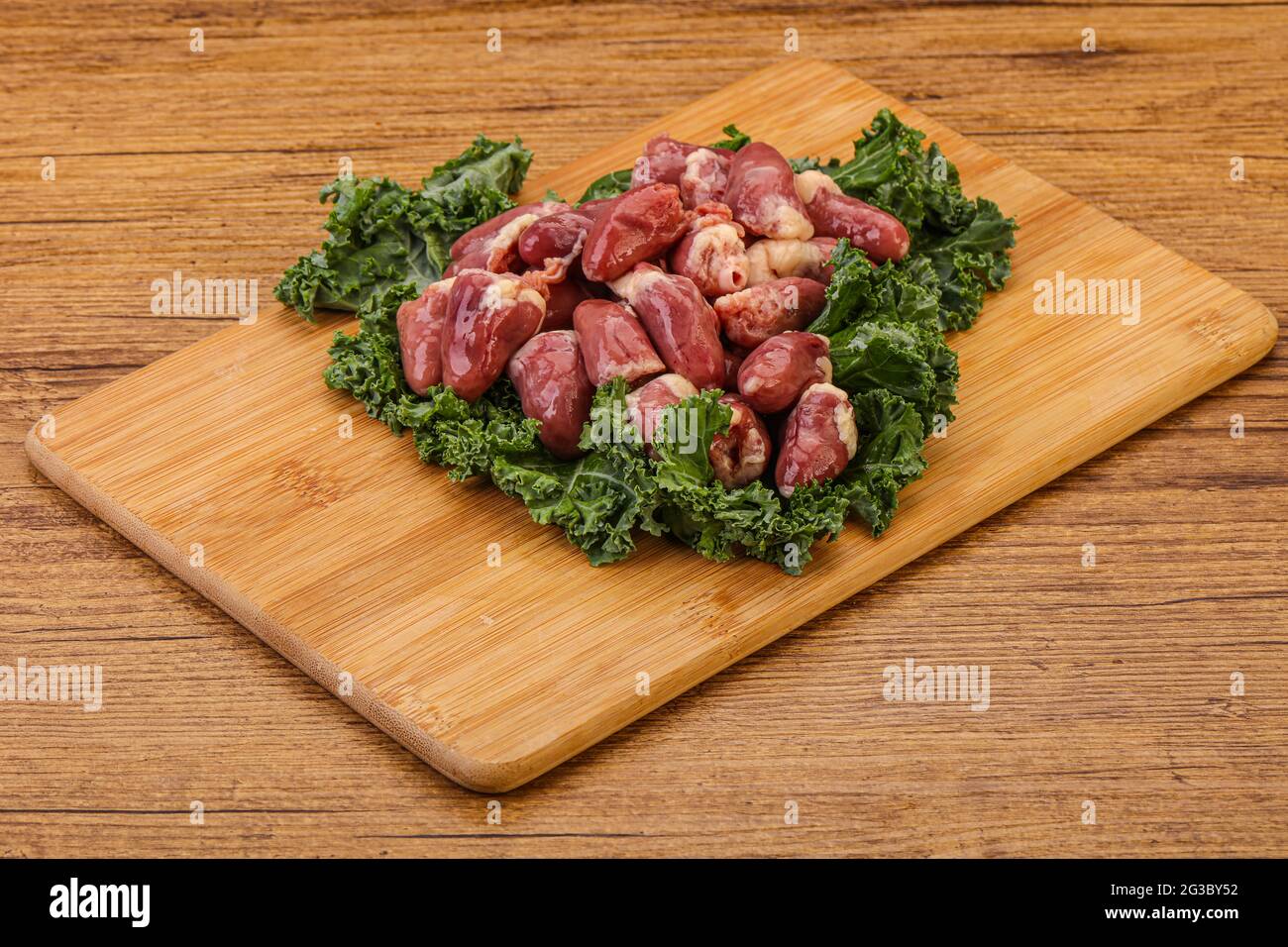 Raw chicken hearts heap for cooking Stock Photo - Alamy