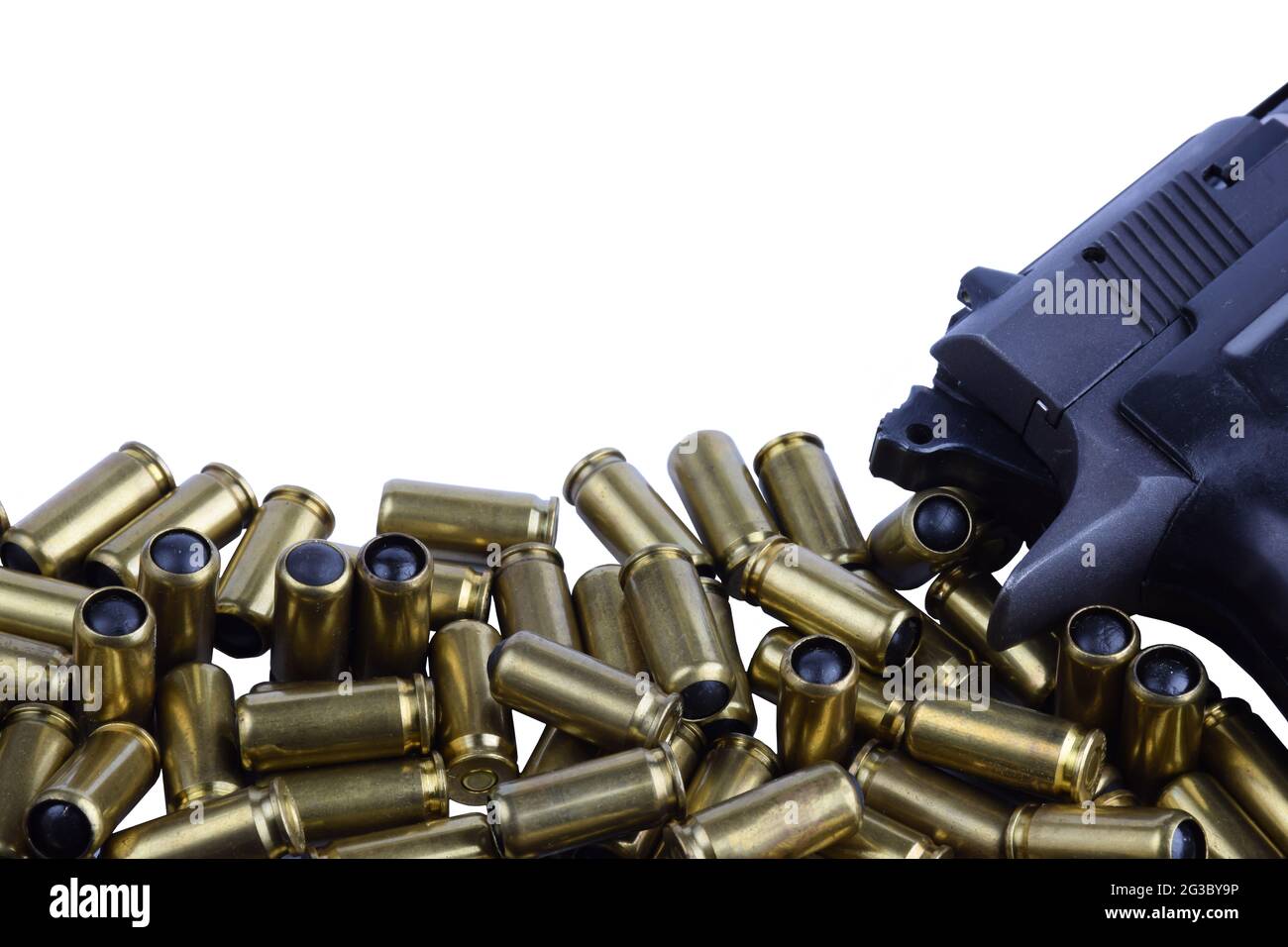 Cartridges for a traumatic gun and a traumatic gun on a white ...