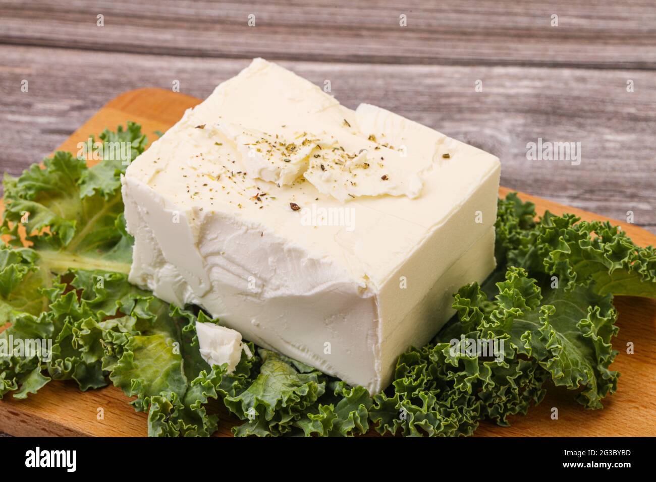 Traditional tasty Greek Feta soft cheese brick Stock Photo - Alamy