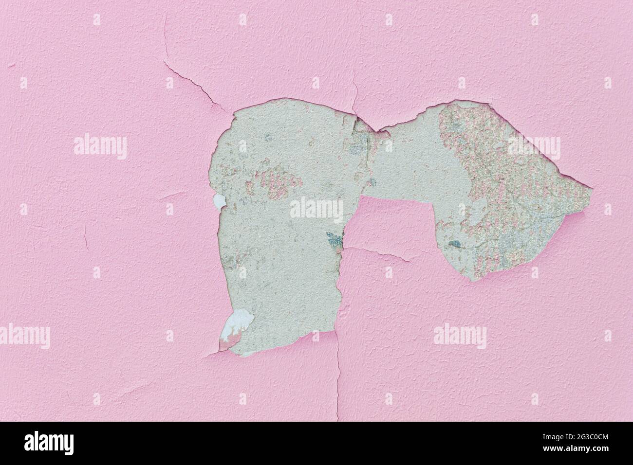 Peeling paint and plaster from the wall. Bloated paint and plaster ...