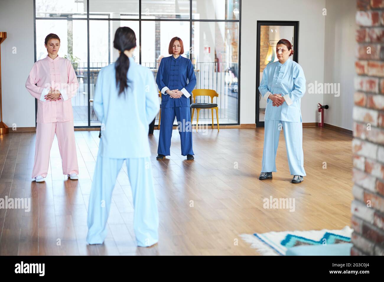 Women doing exercises for self healing and meditation Stock Photo - Alamy
