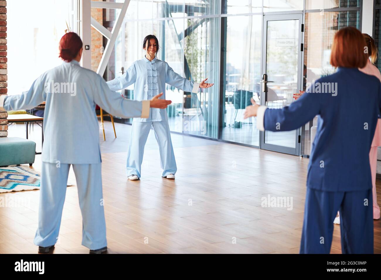 Group of women coordinating slow flowing movements Stock Photo - Alamy