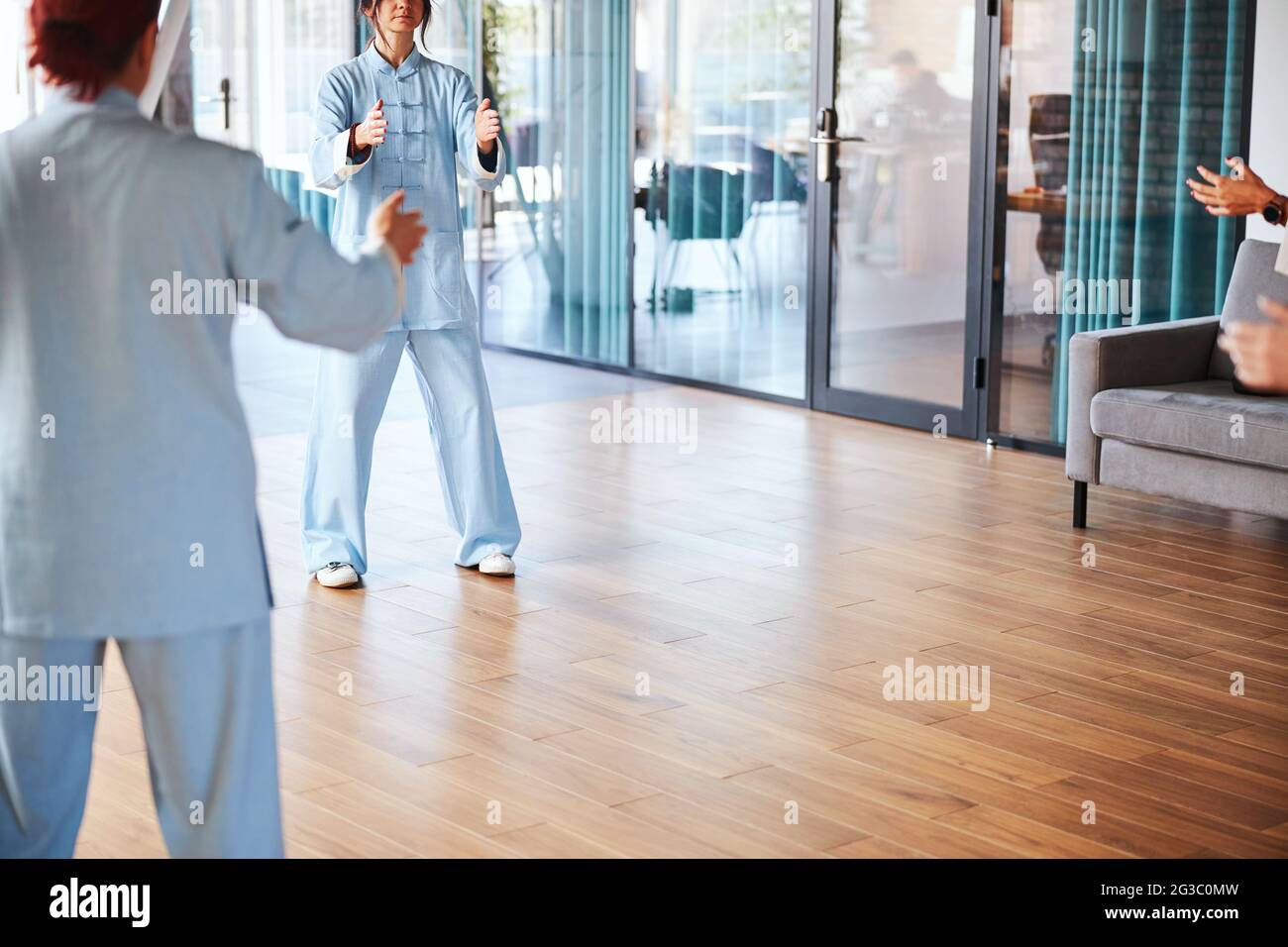 Group of people standing in specific postures while meditating Stock ...