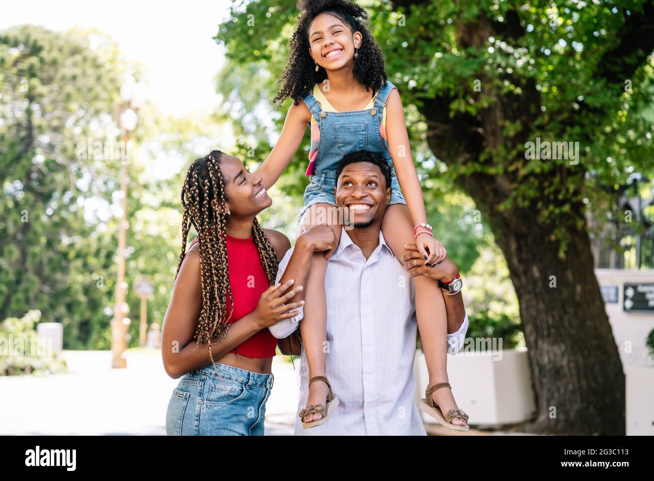 Family enjoying a walk together outdoors Stock Photo - Alamy
