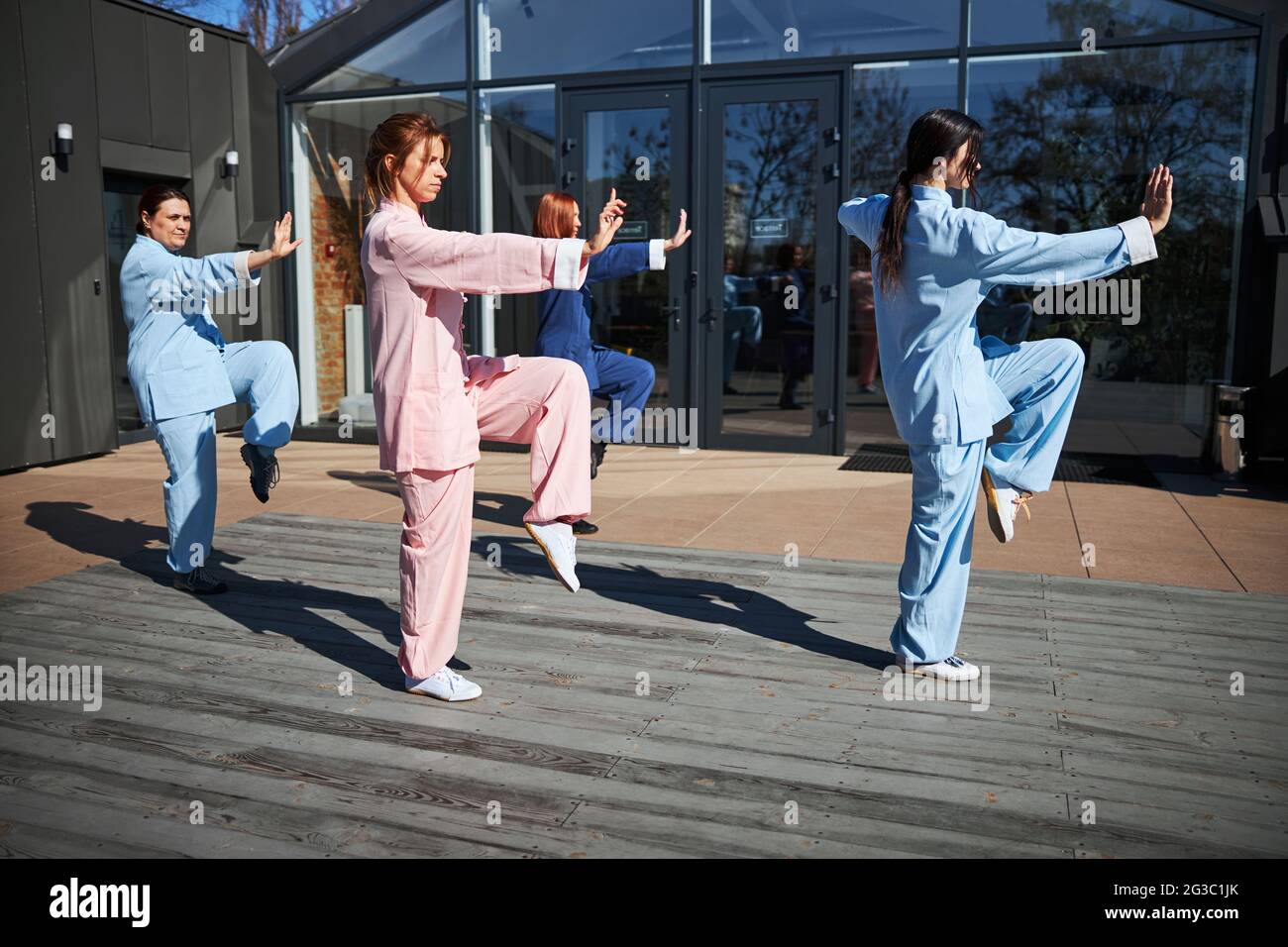 Keeping physical balance while standing on one foot Stock Photo - Alamy