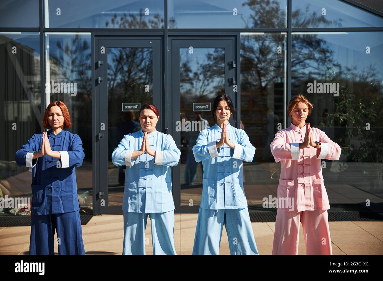 Calm ladies bringing serenity and clarity to their minds Stock Photo ...