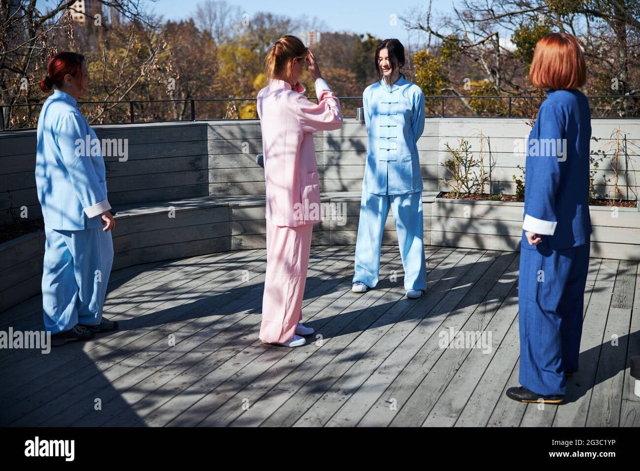 Group of women communicating outdoors and looking relaxed Stock Photo ...