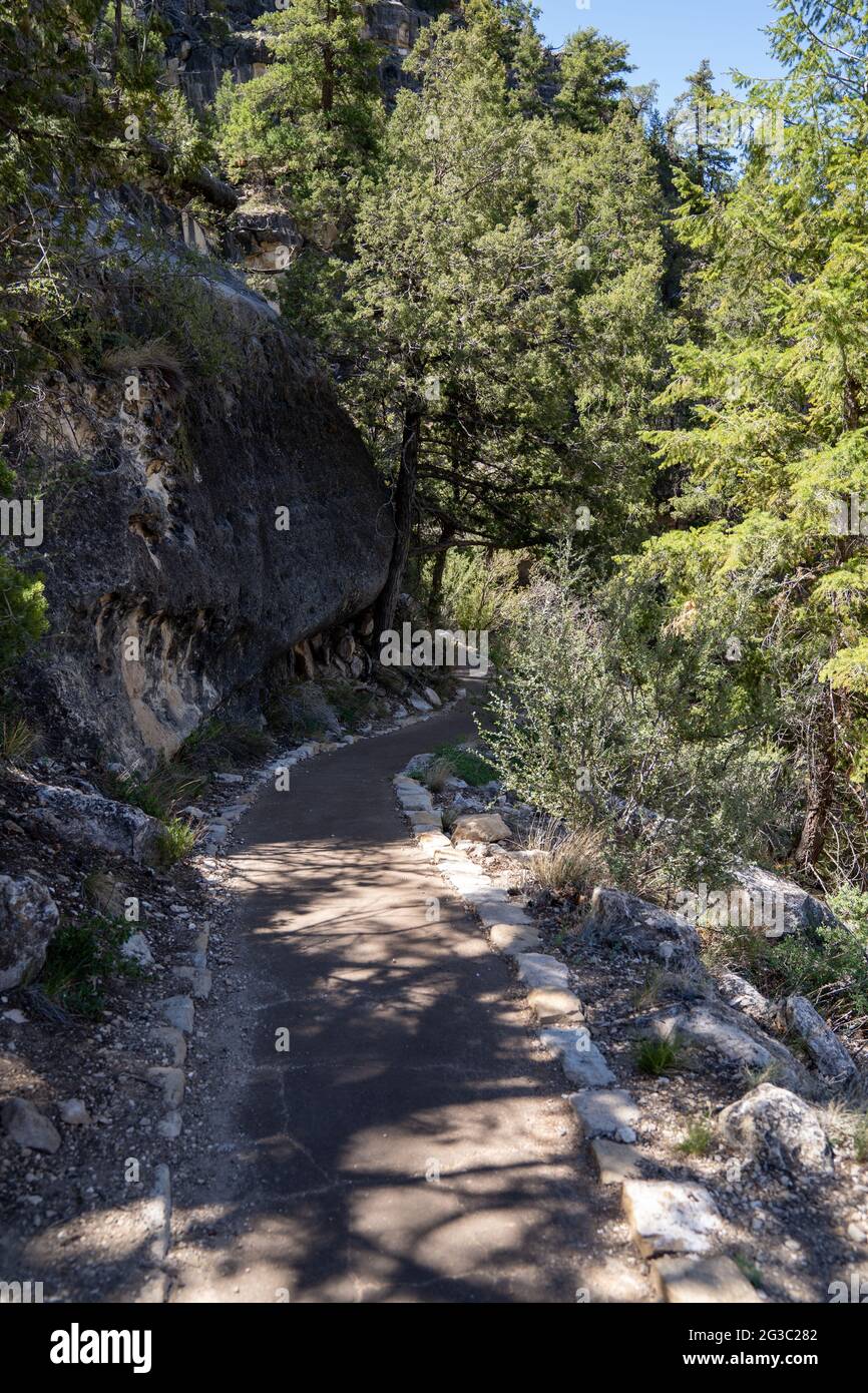 Paved hiking trail along the Island Trail in Walnut Canyon National ...