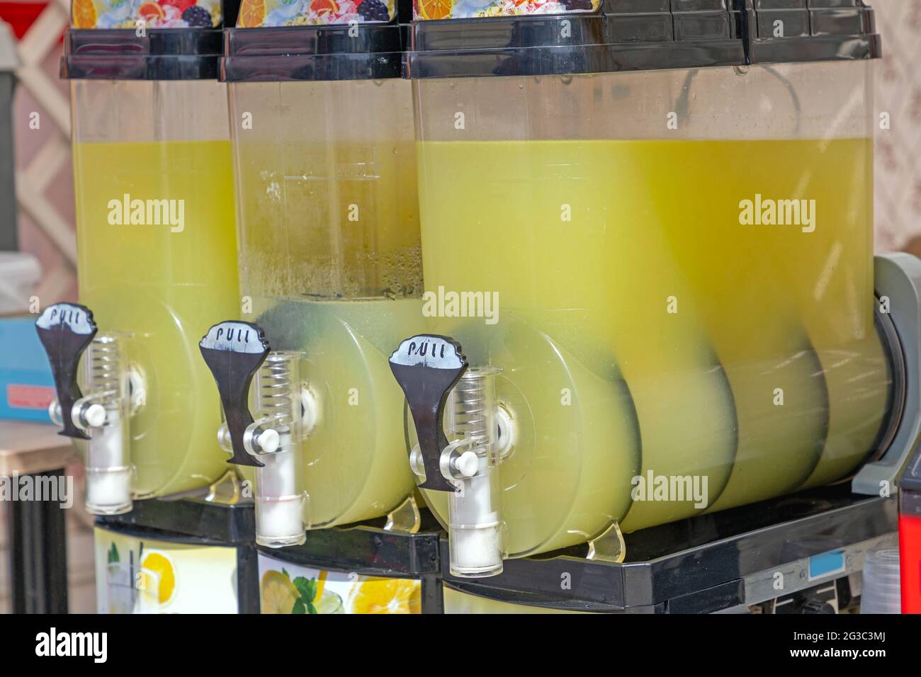 Cold Lemonade in Refrigerated Dispenser for Three Beverages Stock Photo ...
