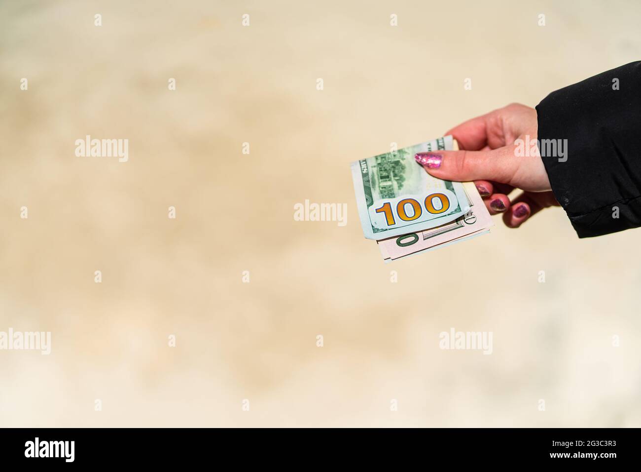 Woman hand holding and giving money. World money concept, close up of ...