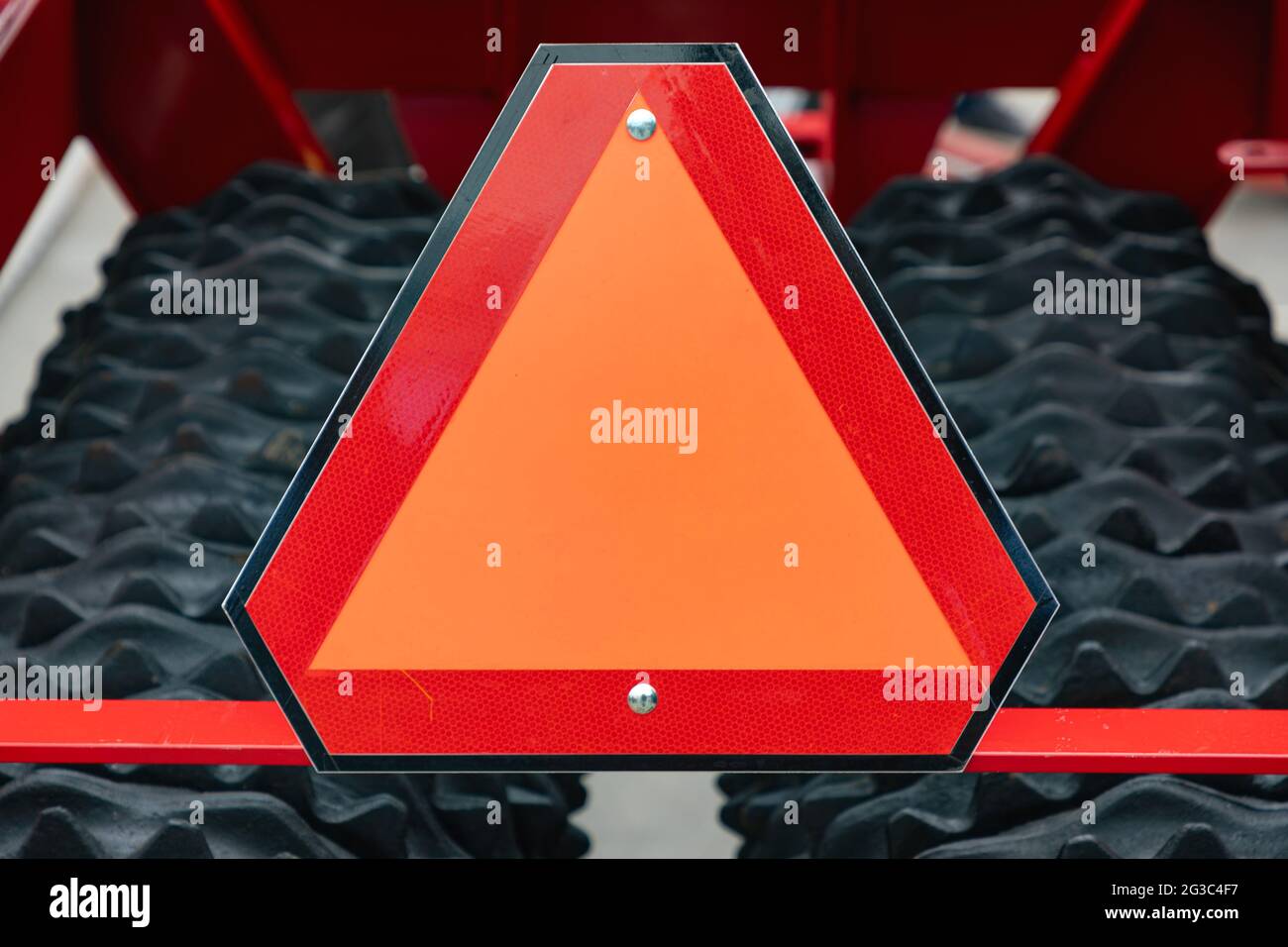 Safety Red Triangle at Rear End of Agricultural Machinery Stock Photo ...