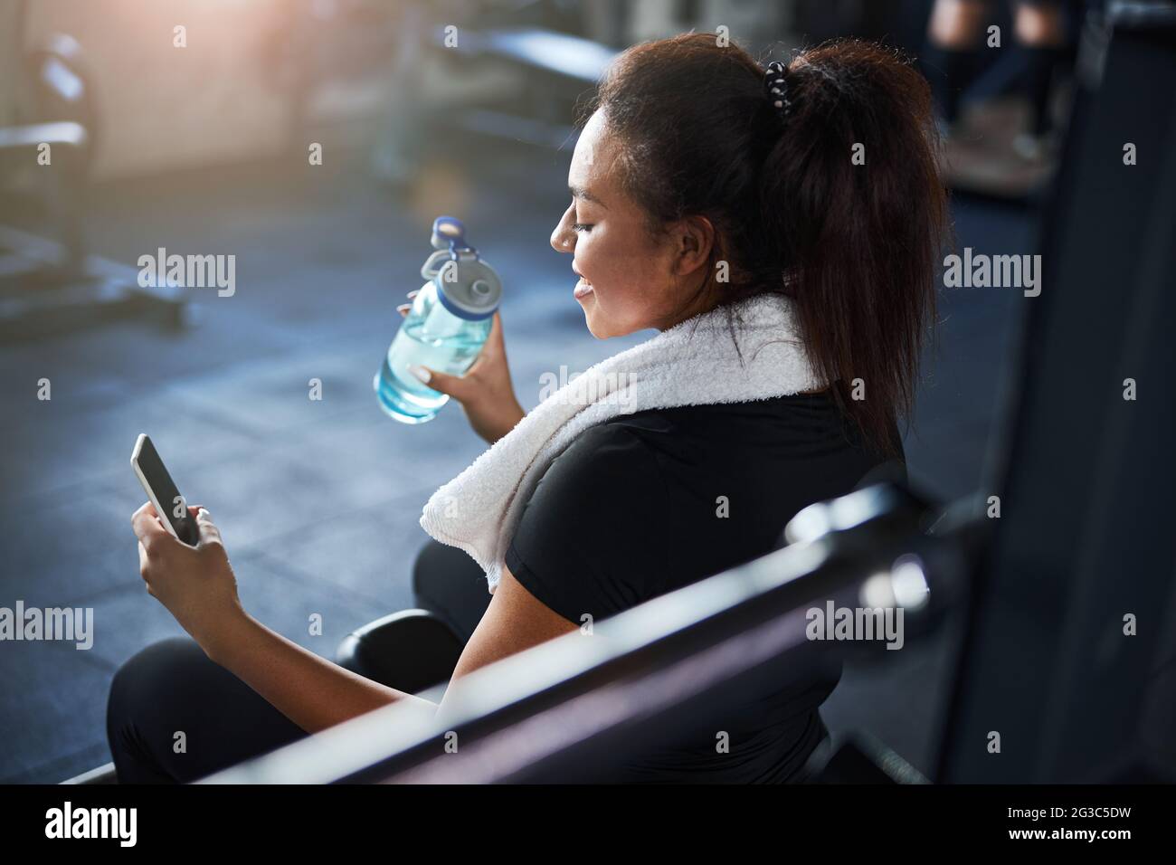 Woman online after water hi-res stock photography and images - Alamy