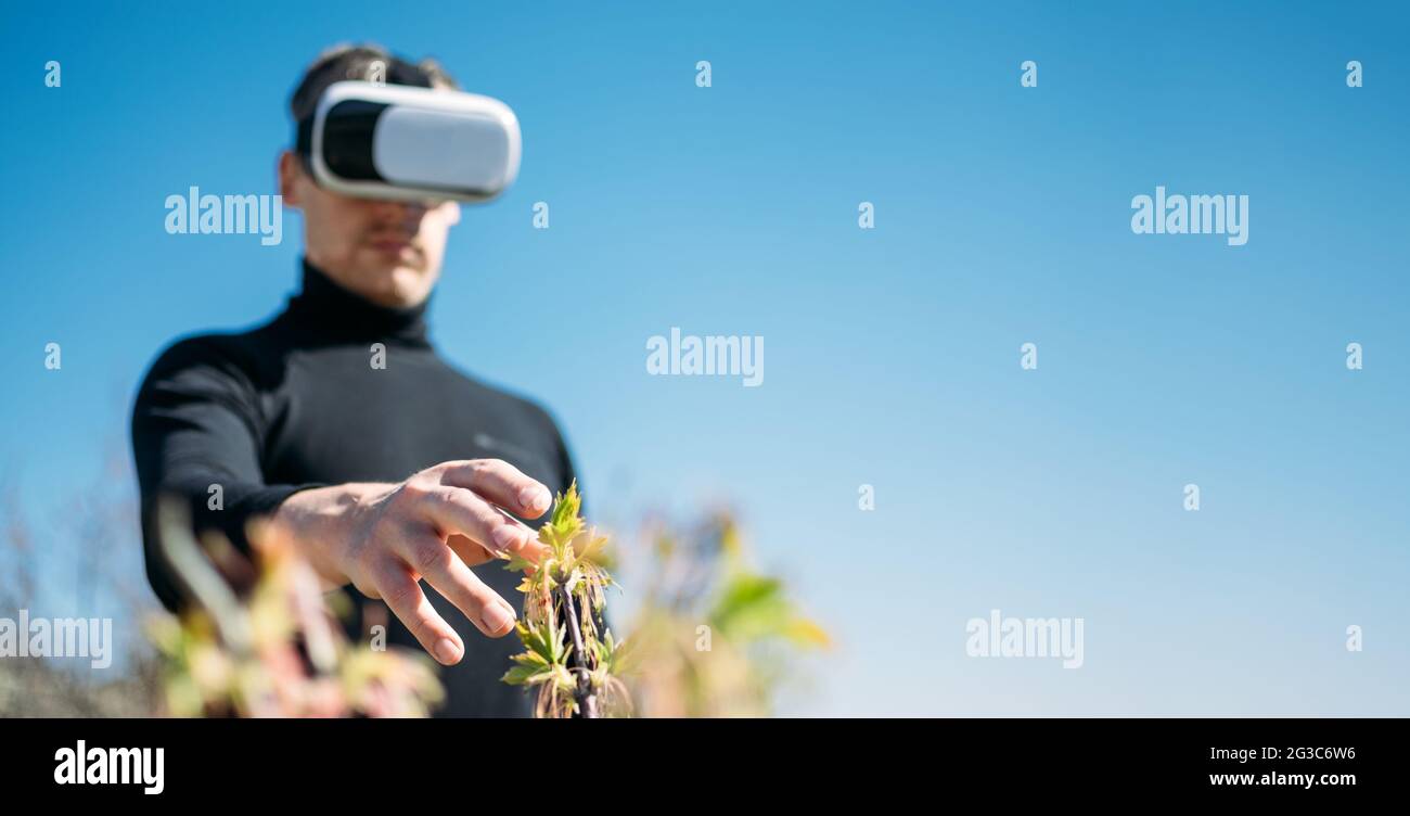 Man Wearing Virtual Reality Glasses In Nature High Resolution Stock ...