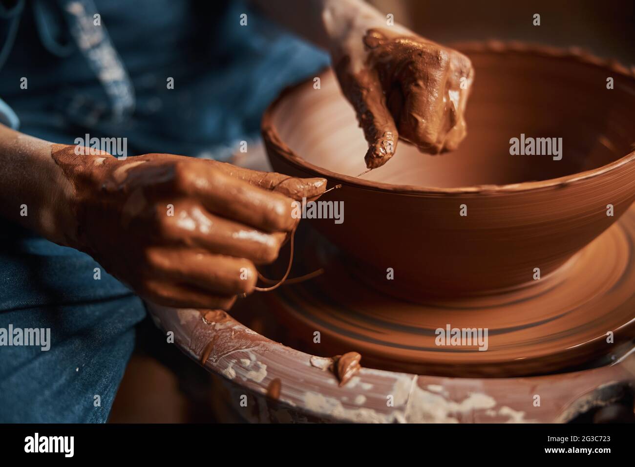 Image of process creating texture on pottery wheel in workshop Stock ...