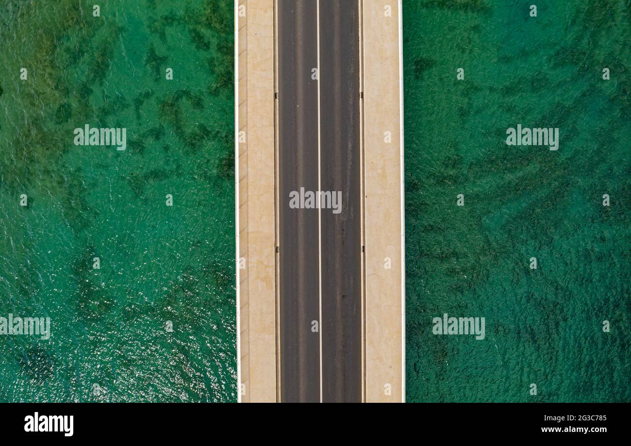 Aerial top view of a long bridge above a sea Stock Photo - Alamy