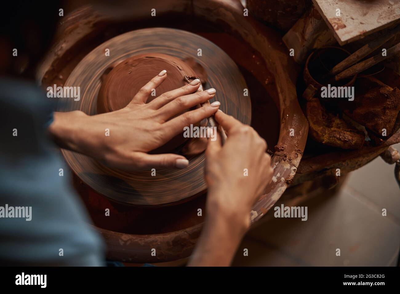Picture of delicate process of manufacturing clay product on pottery ...