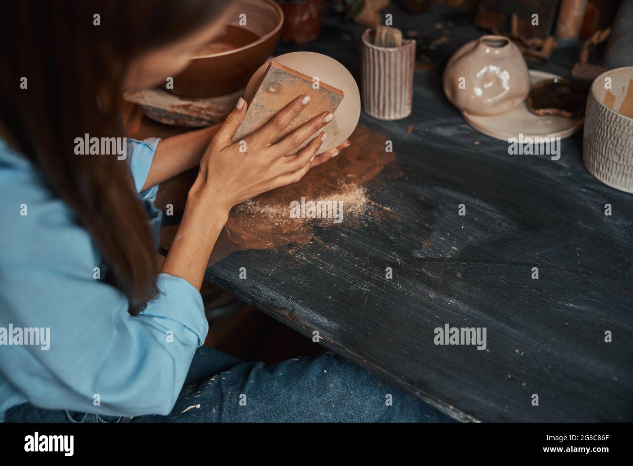 Master in uniform pottery hi-res stock photography and images - Alamy