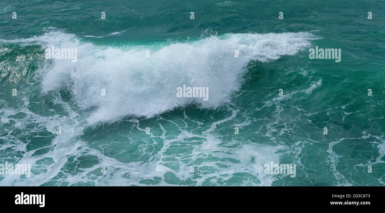 Beautiful view of ocean waves and a fantastic rocky shore, Sea patterns ...