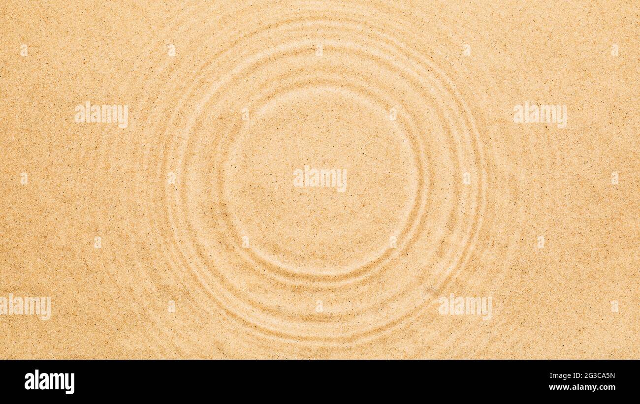 Water rings on water surface over sand. Summer texture background with ...