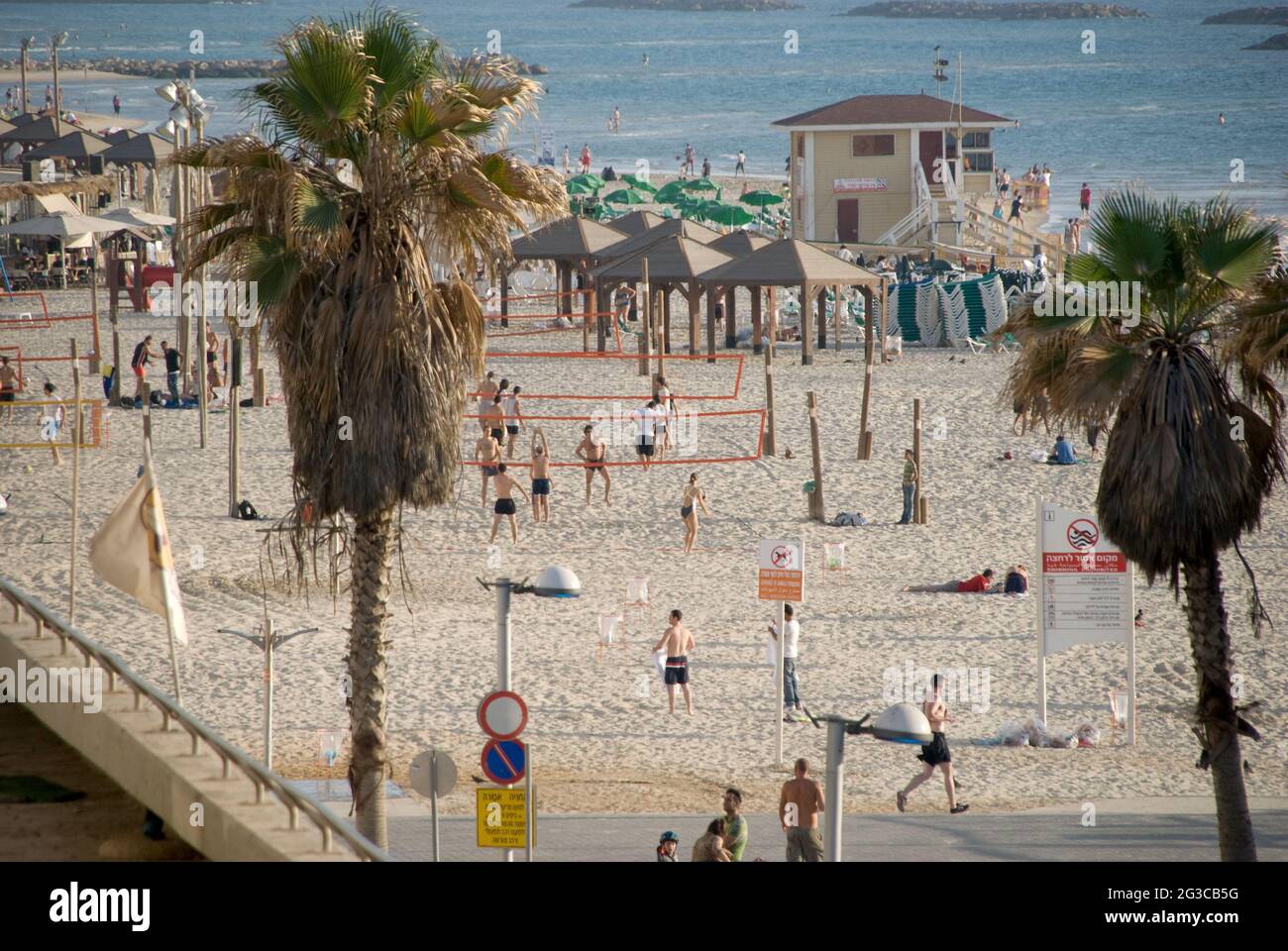 TEL AVIV, ISRAEL - May 24, 2021: People enjoying the summer on beach in ...