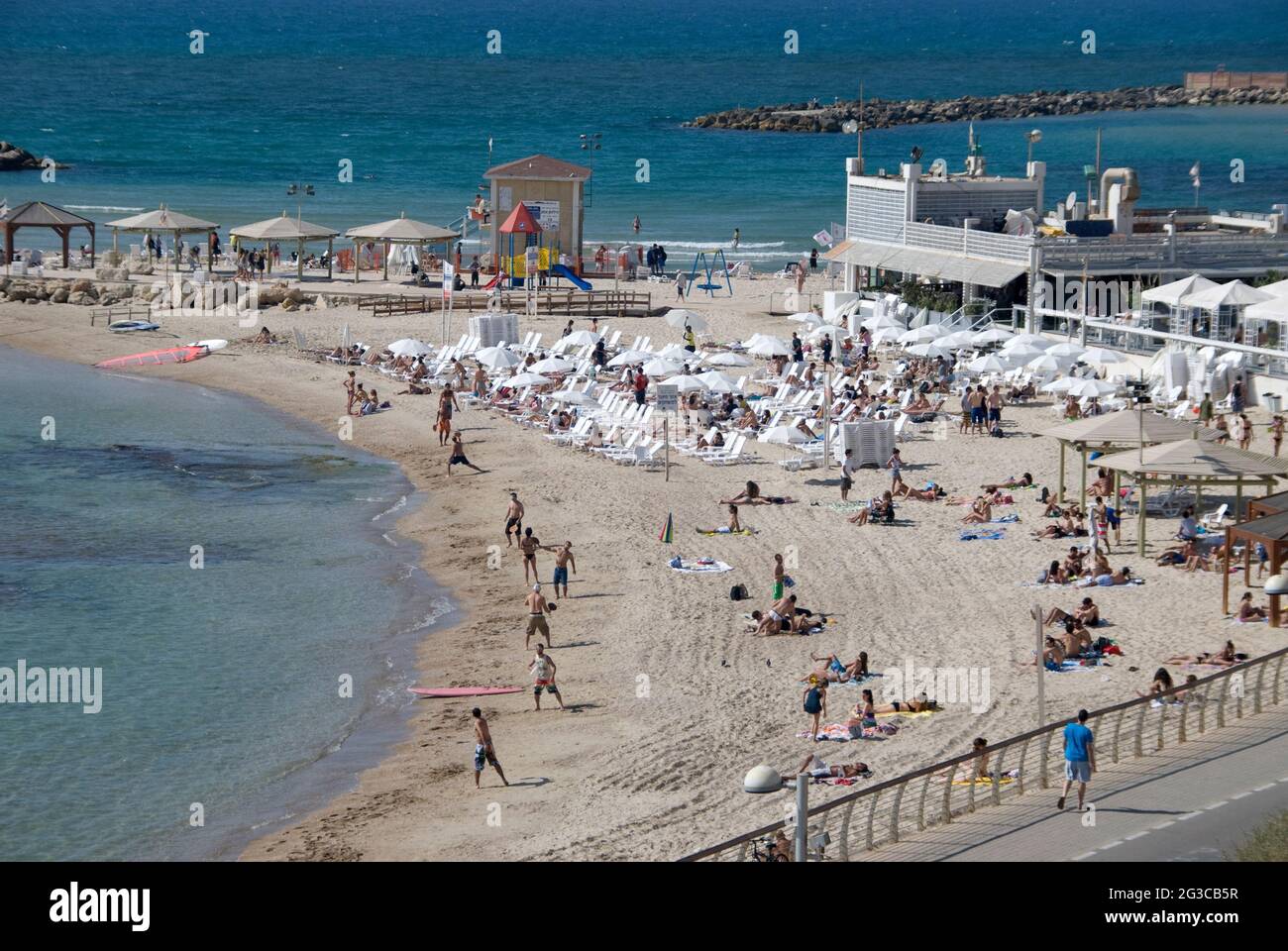 TEL AVIV, ISRAEL - May 24, 2021: People enjoying the summer on beach in ...
