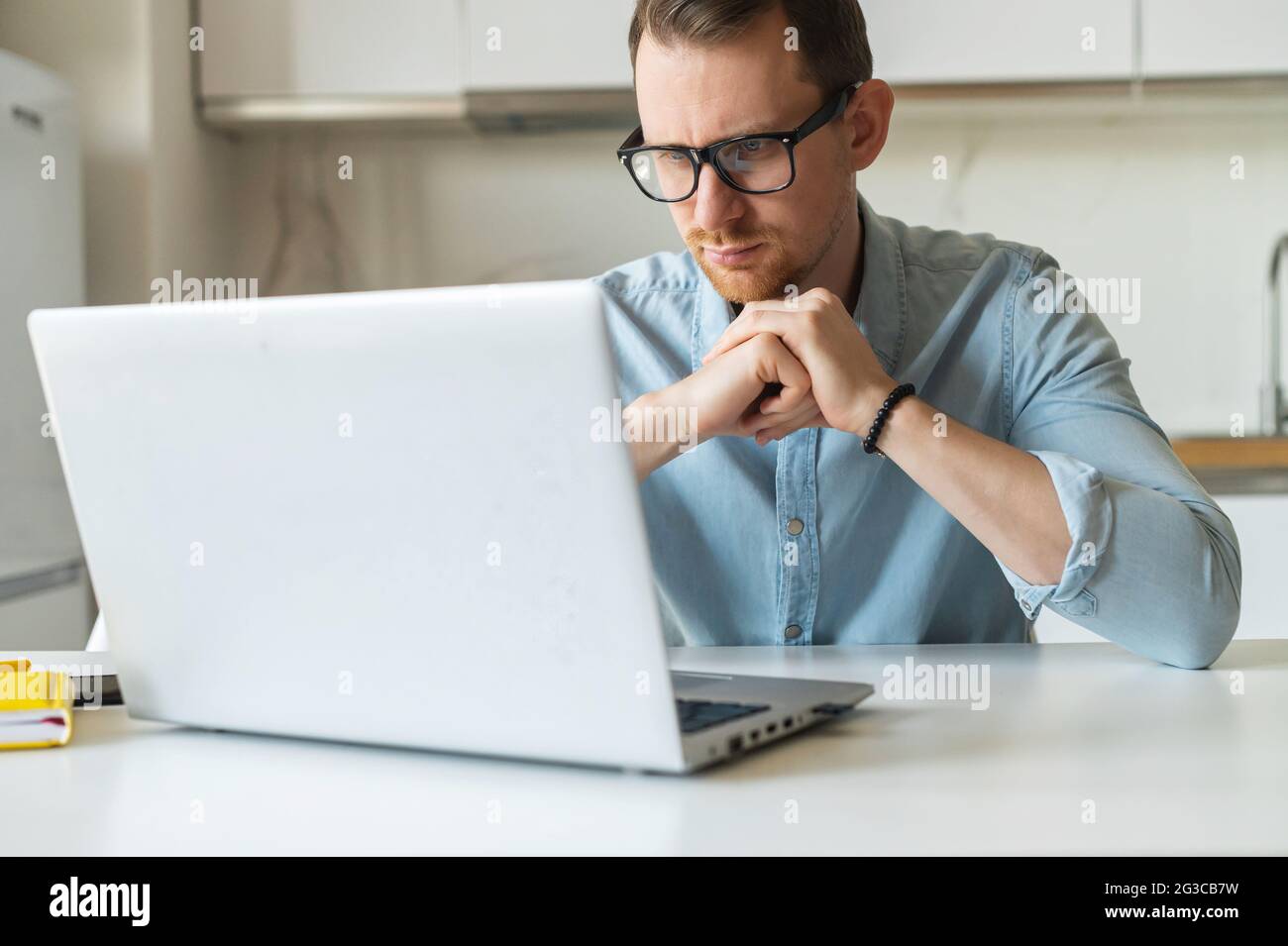 Focused young man thinking idea hi-res stock photography and images - Alamy