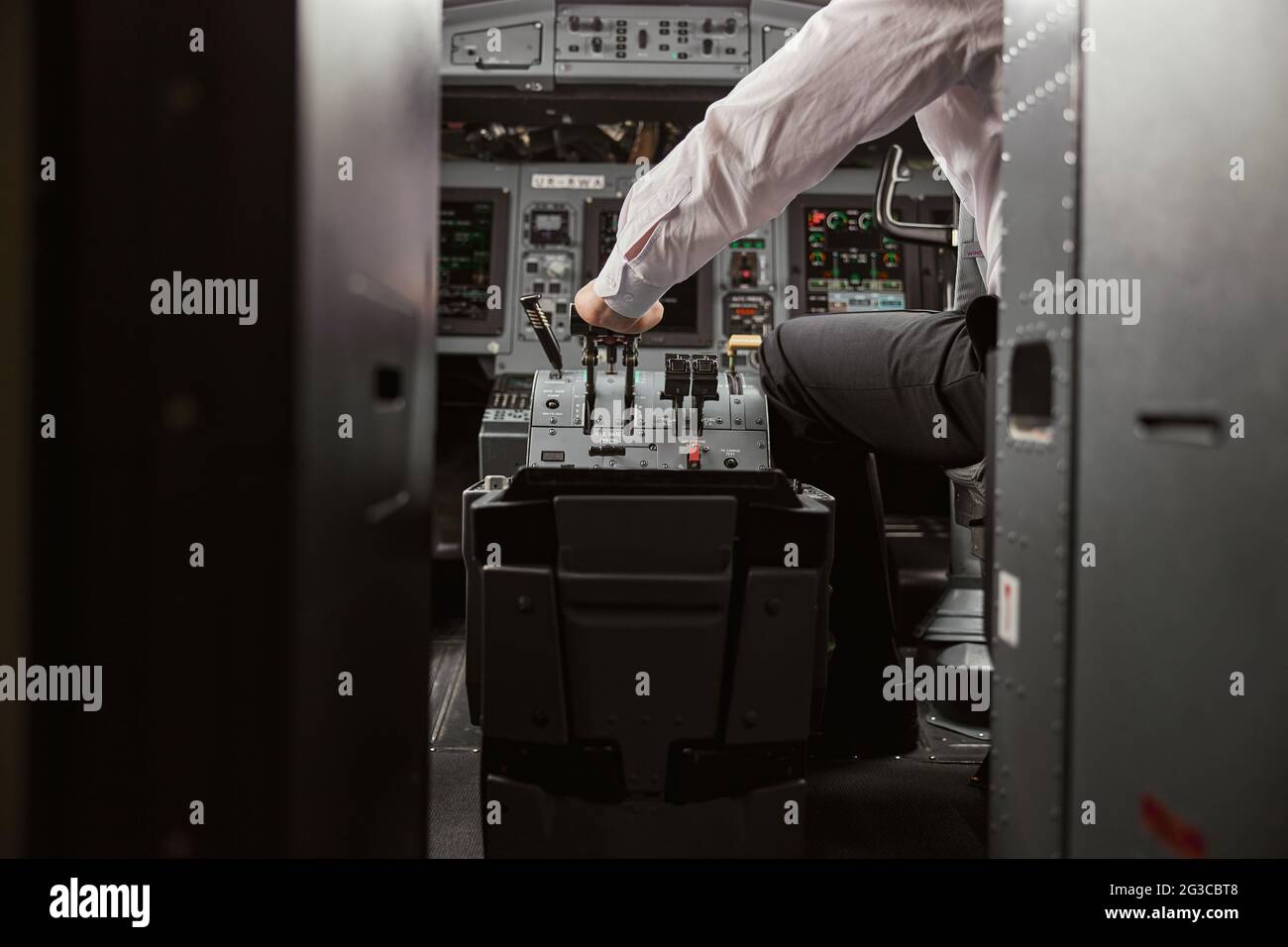 Pilot use steering to fly on passenger airplane Stock Photo - Alamy