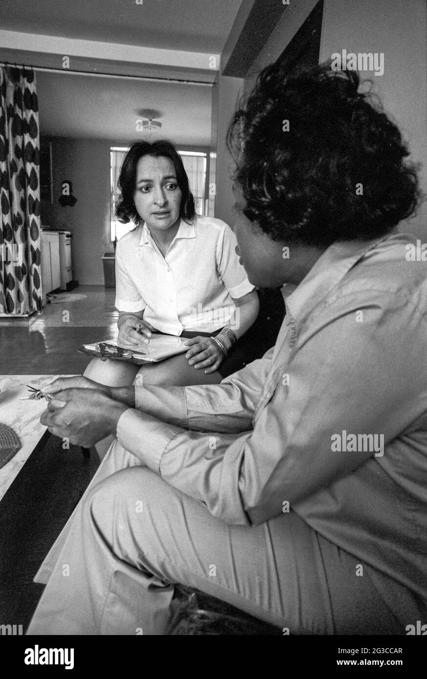 Social worker talking client Black and White Stock Photos & Images - Alamy